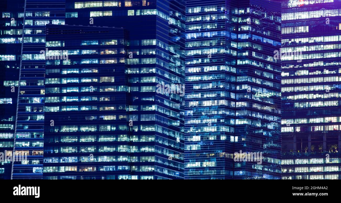 skyscrapers windows at night in Singapore Stock Photo - Alamy