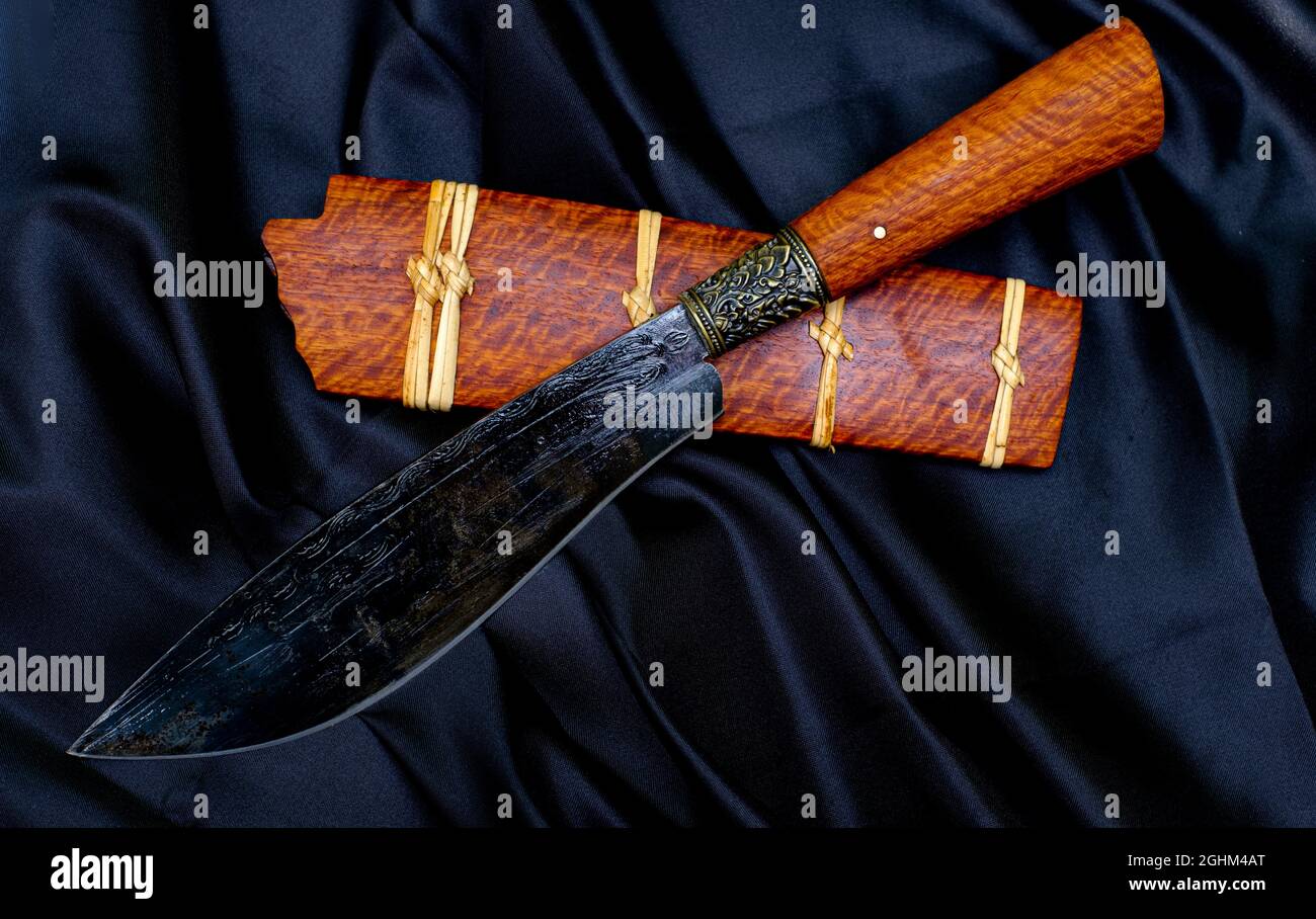 knife custom or Enep in the natural wood scabbard on old table ...