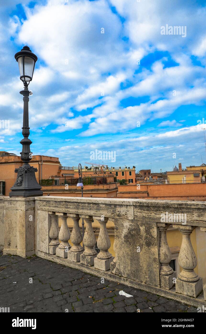 View to the roofs of Rome, Italy with street light Stock Photo - Alamy