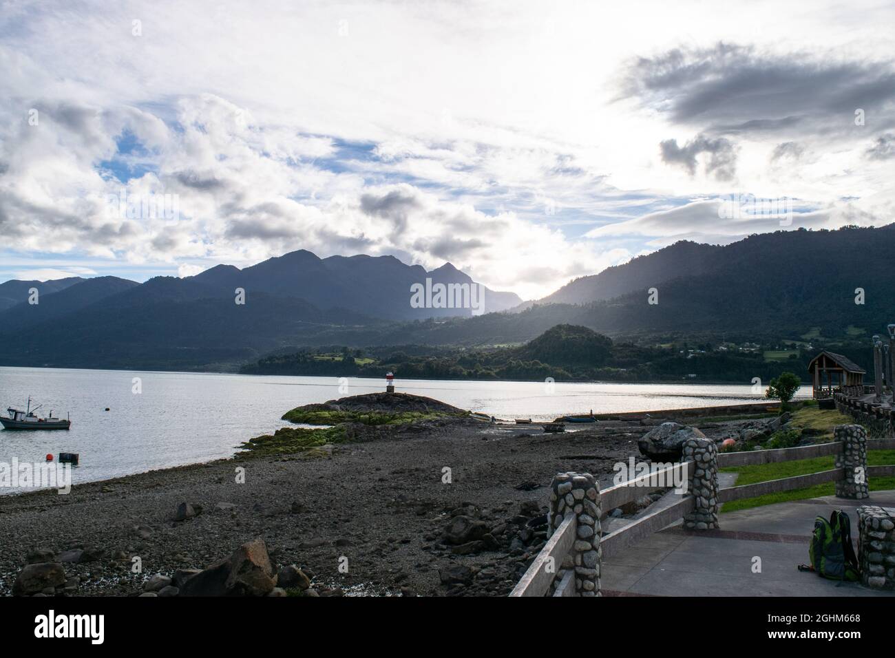 The harbor ramp leads to a lighthouse on a small island in Cochamo ...