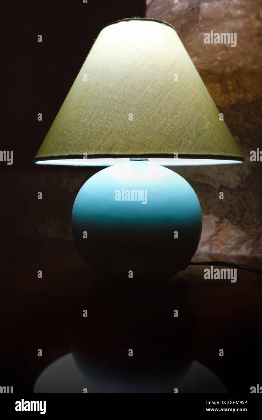 Bedside night illuminated lampshade light lamp with round blue base and ...
