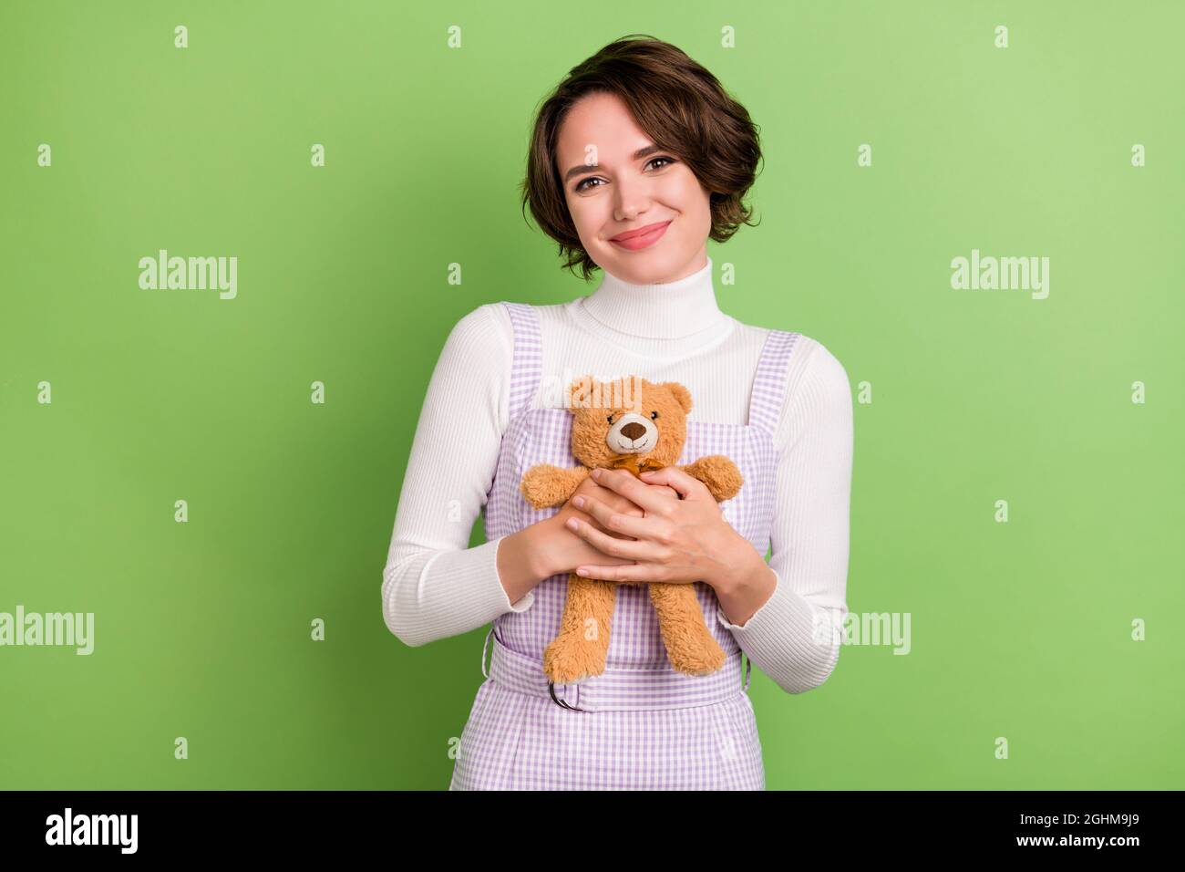 Photo of young attractive girl happy positive smile hug cuddle soft ...