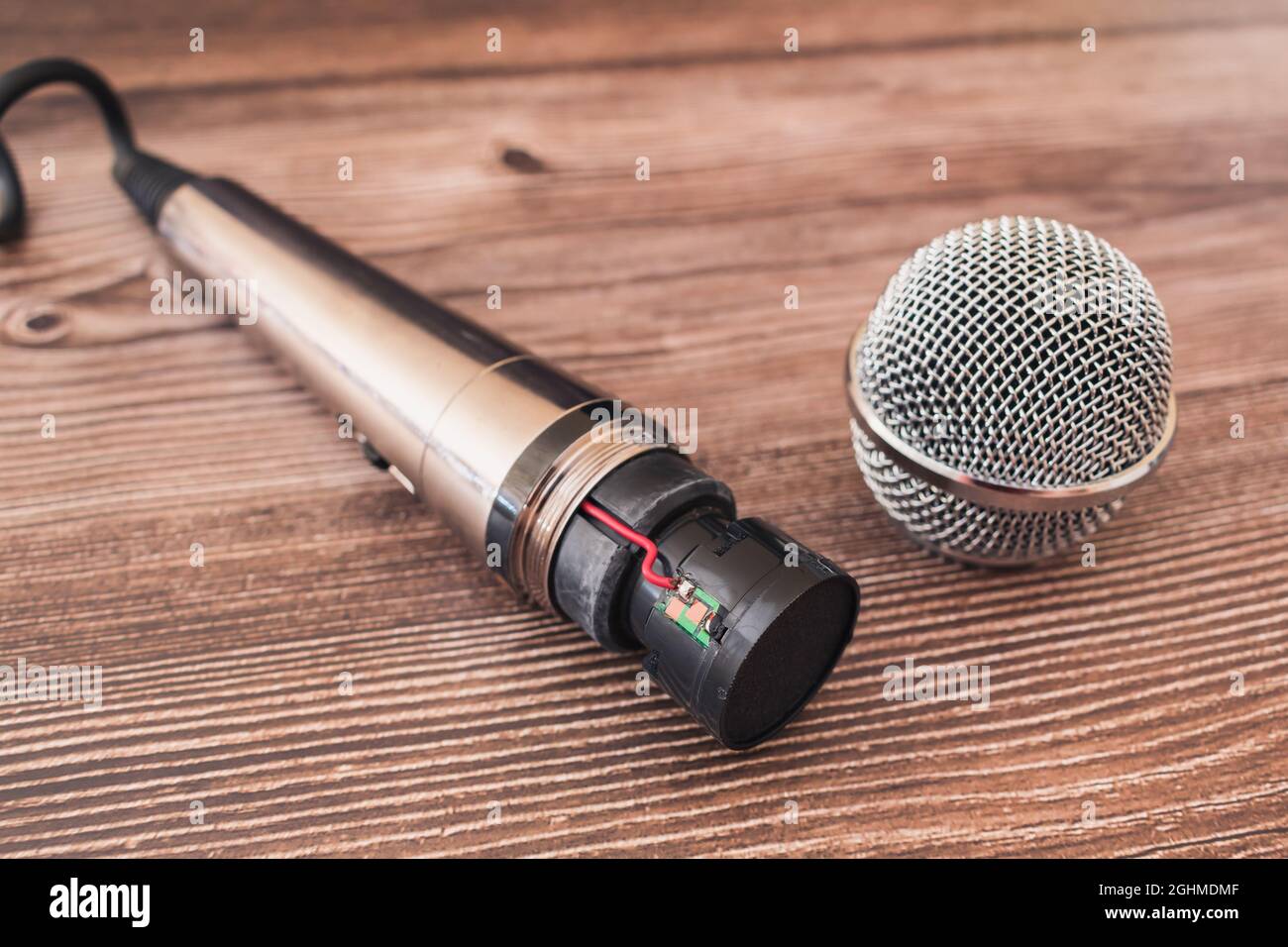 Broken disassembled sound recording microphone under repair Stock Photo ...