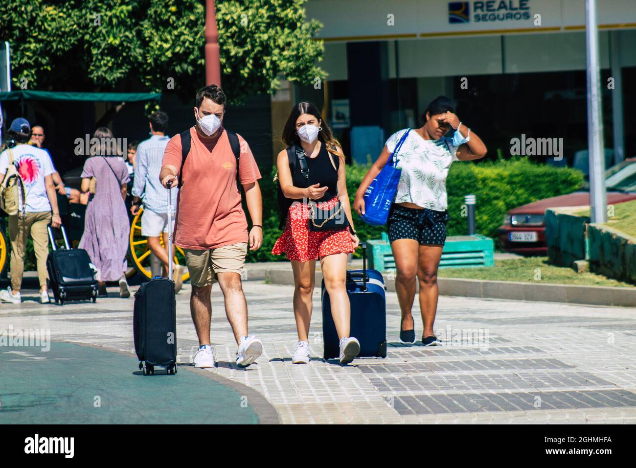 Seville Spain September 04, 2021 Pedestrians walking the street on a ...