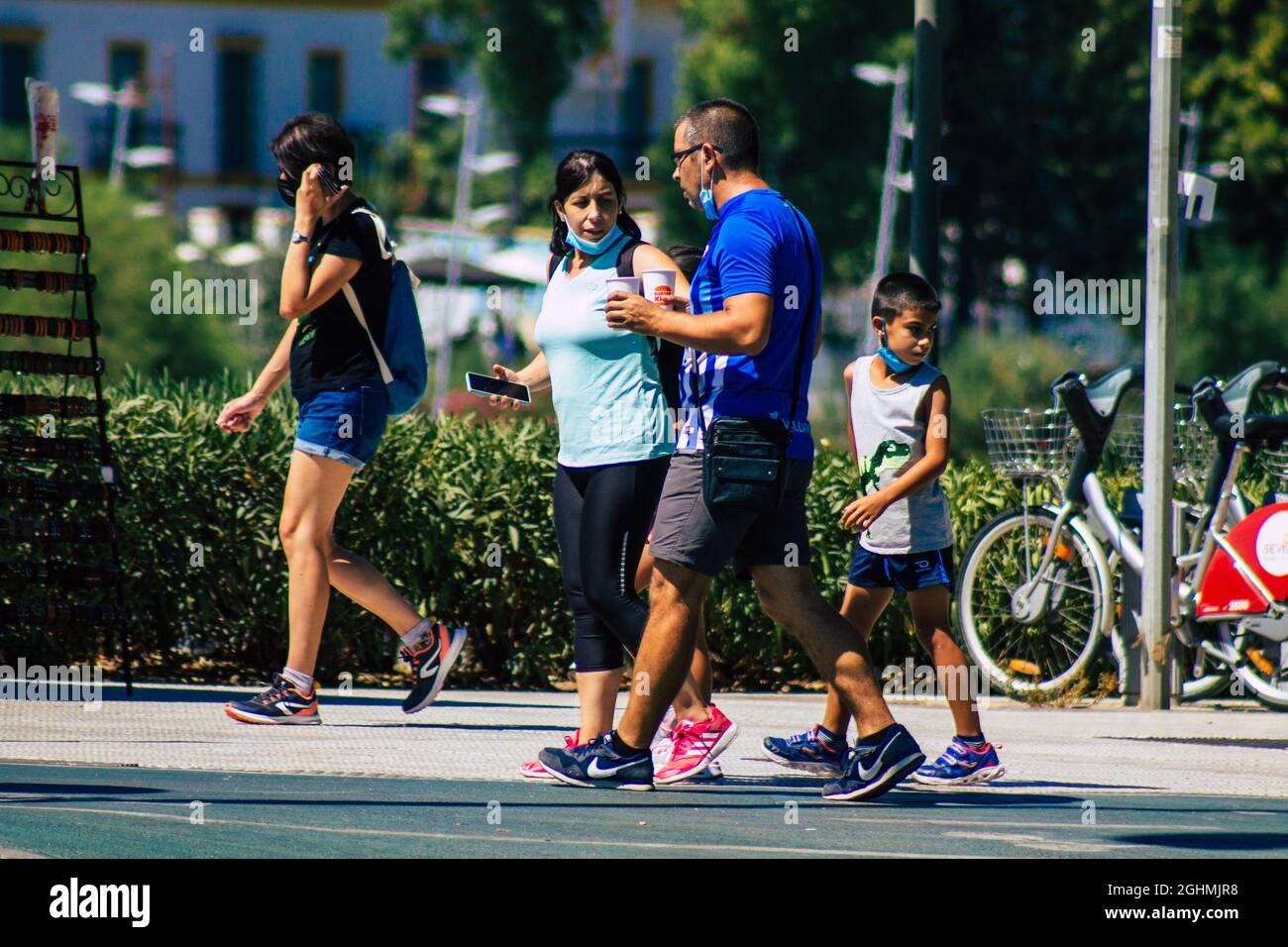 Seville Spain September 04, 2021 Pedestrians walking the street on a ...
