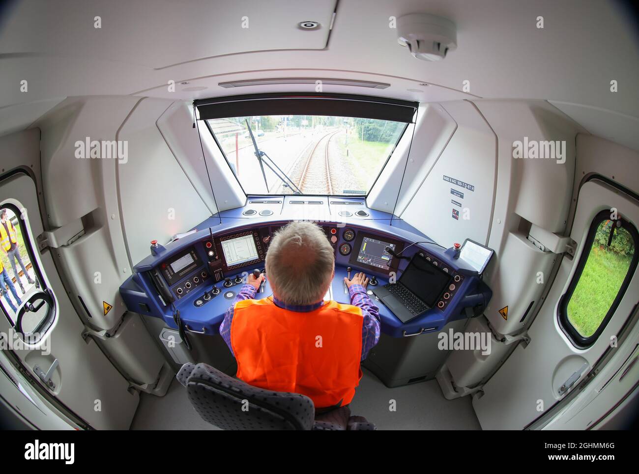 07 September 2021, Saxony, Zschopau: Train driver Bernd Neumann sits in ...