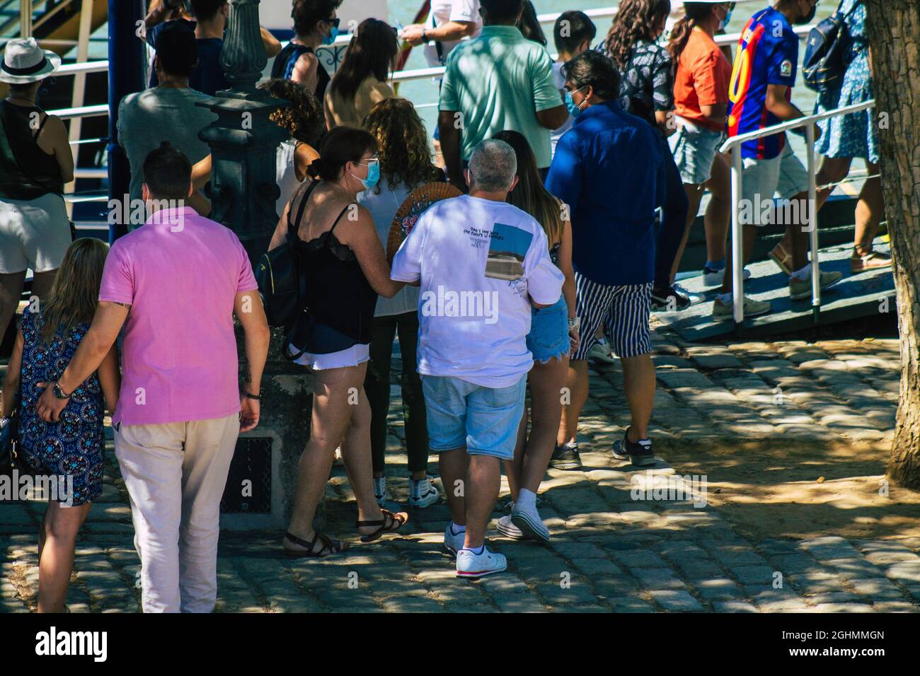 Seville Spain September 04, 2021 Pedestrians walking in the street ...