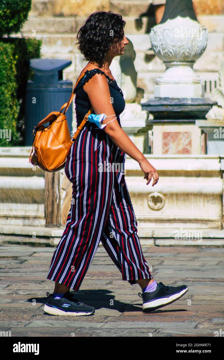 Seville Spain September 04, 2021 Pedestrians walking in the street ...