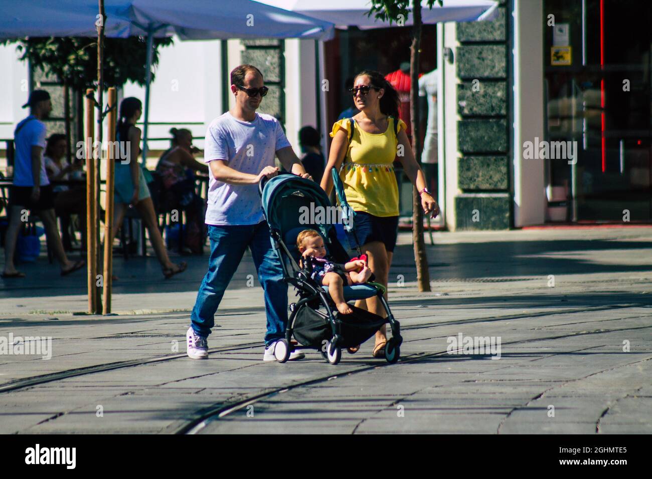 Seville Spain September 04, 2021 Pedestrians walking in the street ...