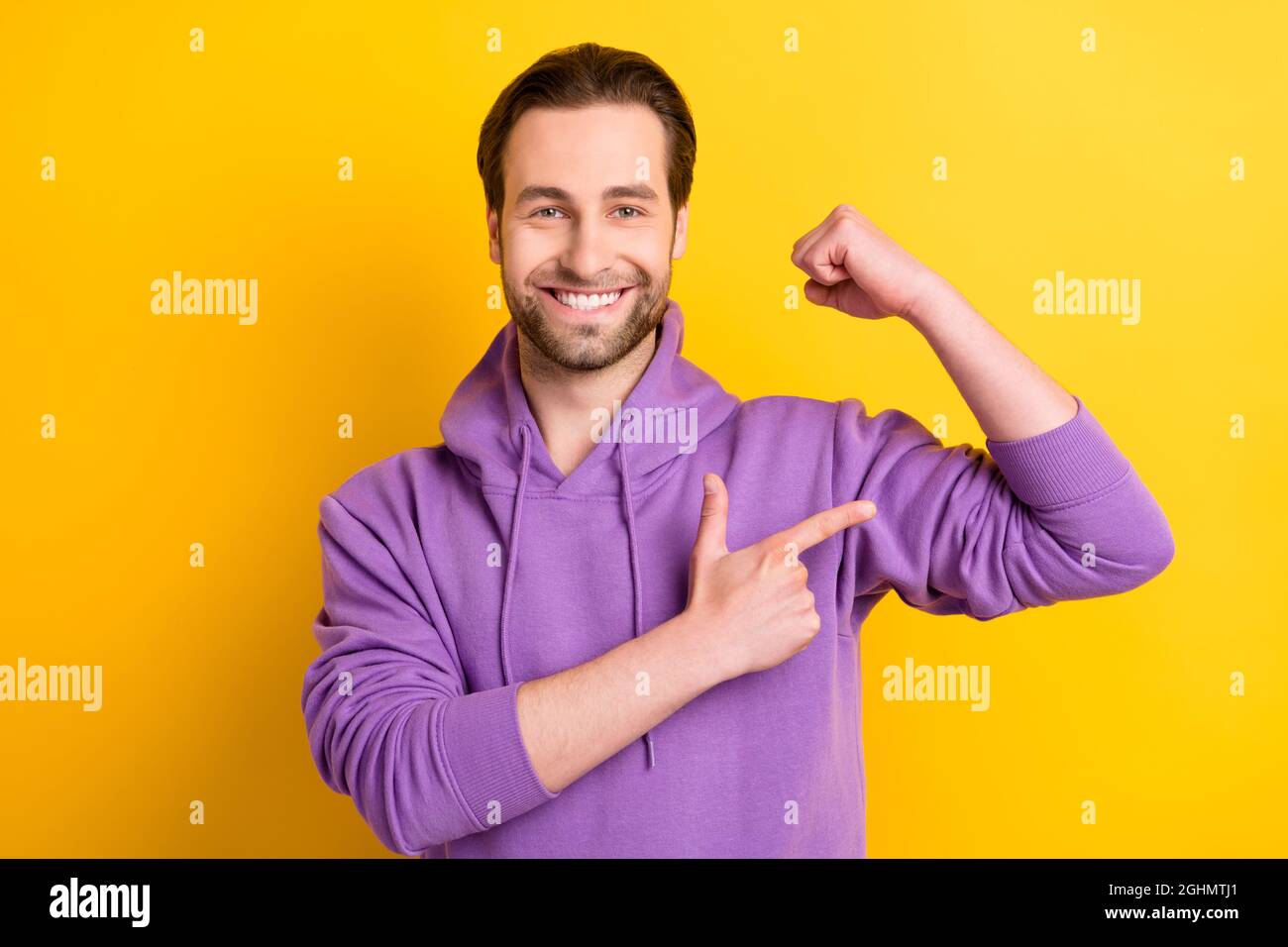 Photo of young guy happy positive smile point finger biceps ad choice ...