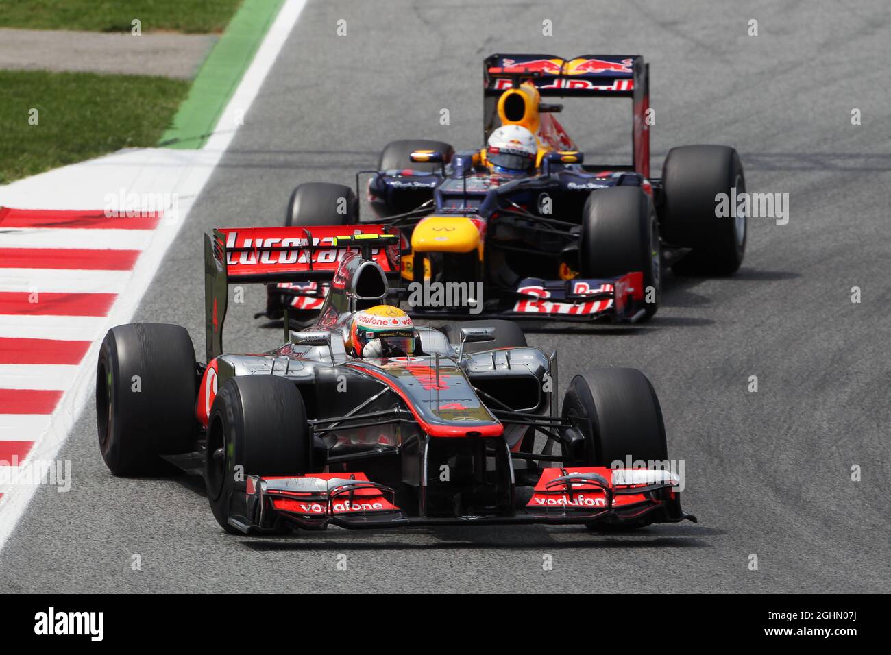 Red bull racing rb8 leads lewis hamilton hi-res stock photography and ...