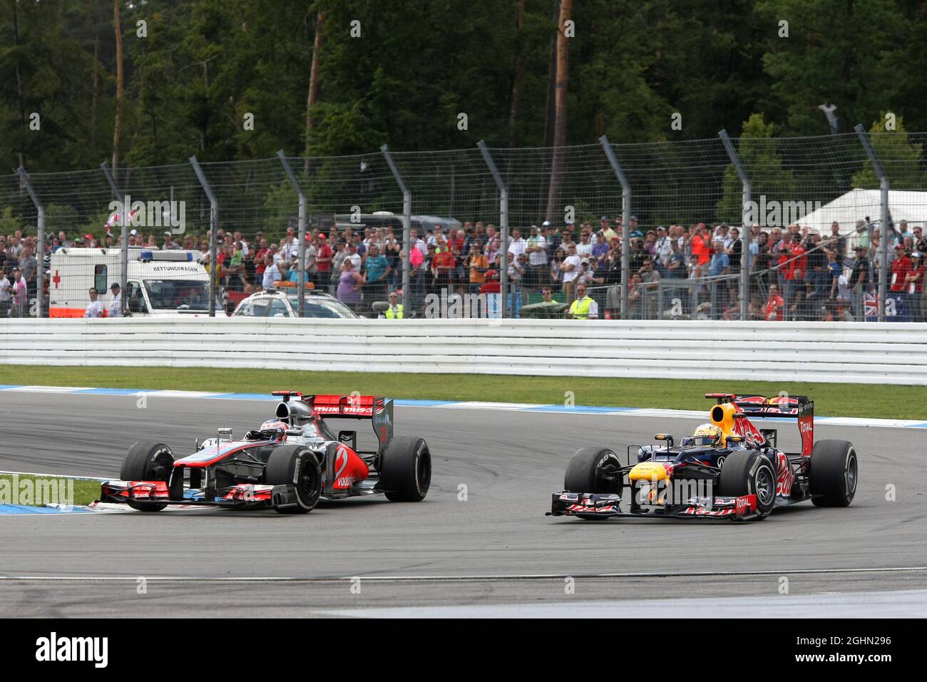 Sebastian Vettel (GER), Red Bull Racing overtakes Jenson Button (GBR ...