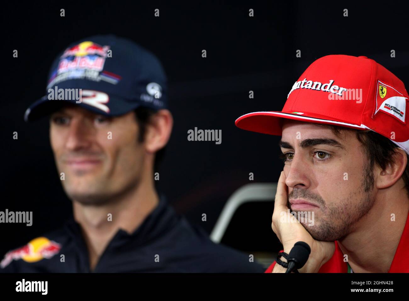 Fernando Alonso (ESP) Ferrari and Mark Webber (AUS) Red Bull Racing in ...