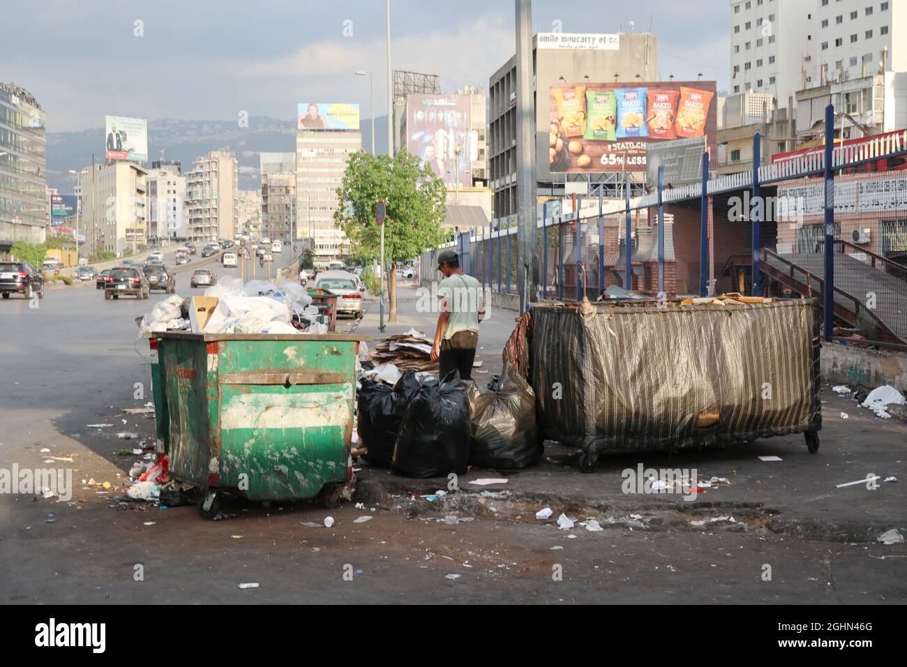 A Syrian boy collects garbage by a highway, Beirut, Lebanon, September ...