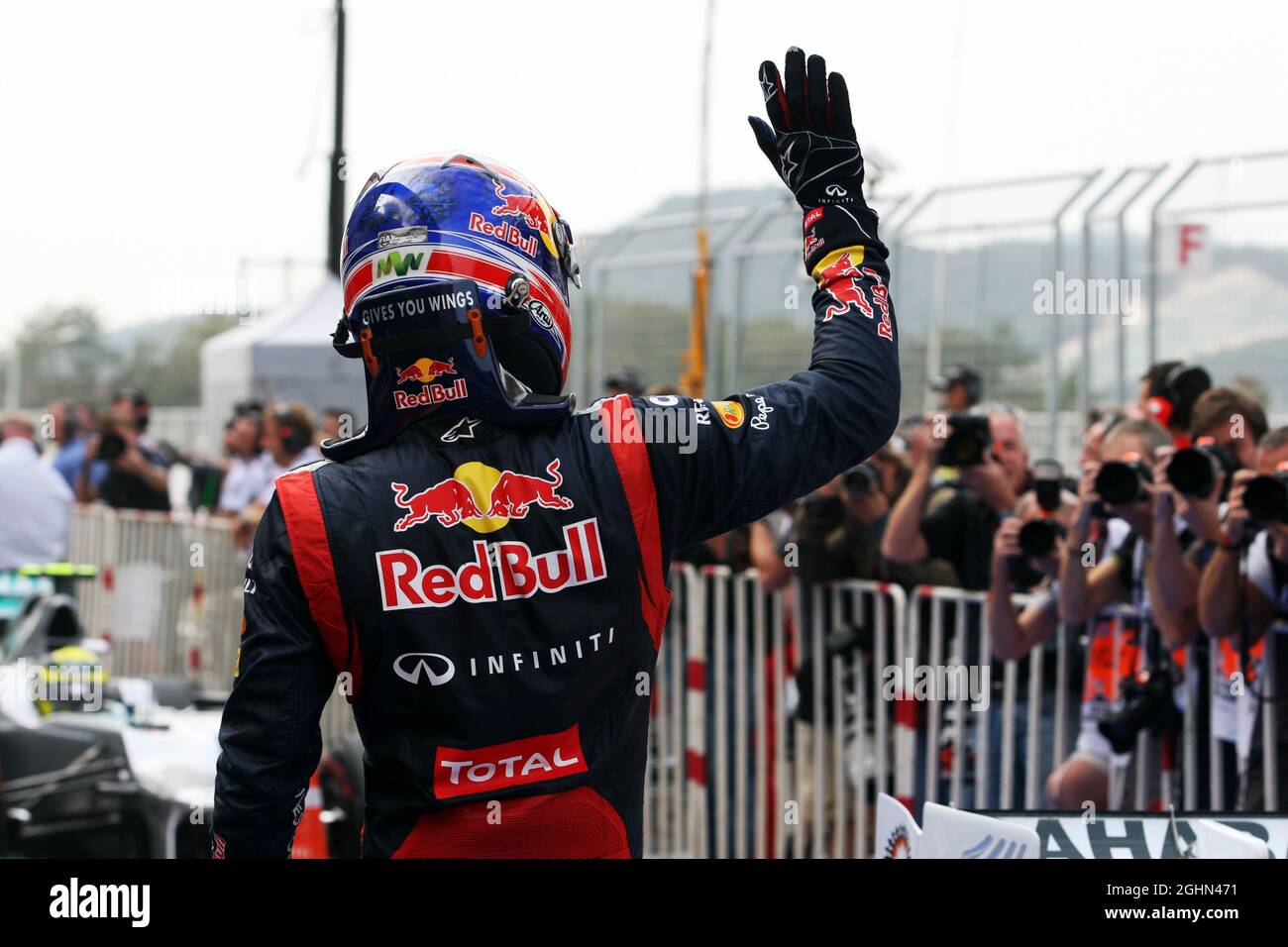 Mark Webber (AUS) Red Bull Racing celebrates his pole position in parc ...