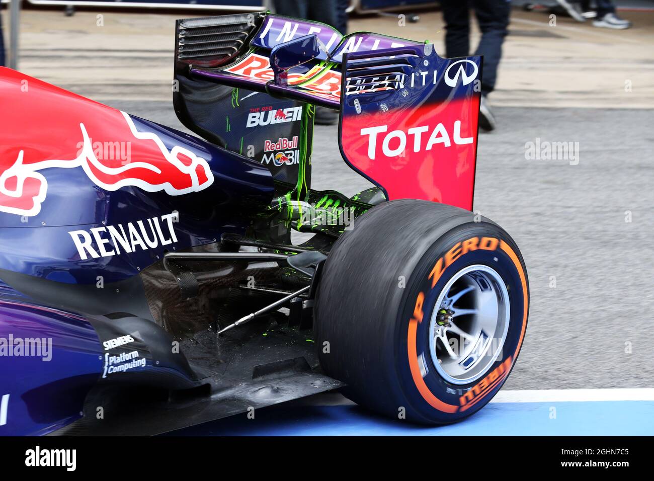 Sebastian Vettel (GER) Red Bull Racing RB9 running flow-vis paint on ...