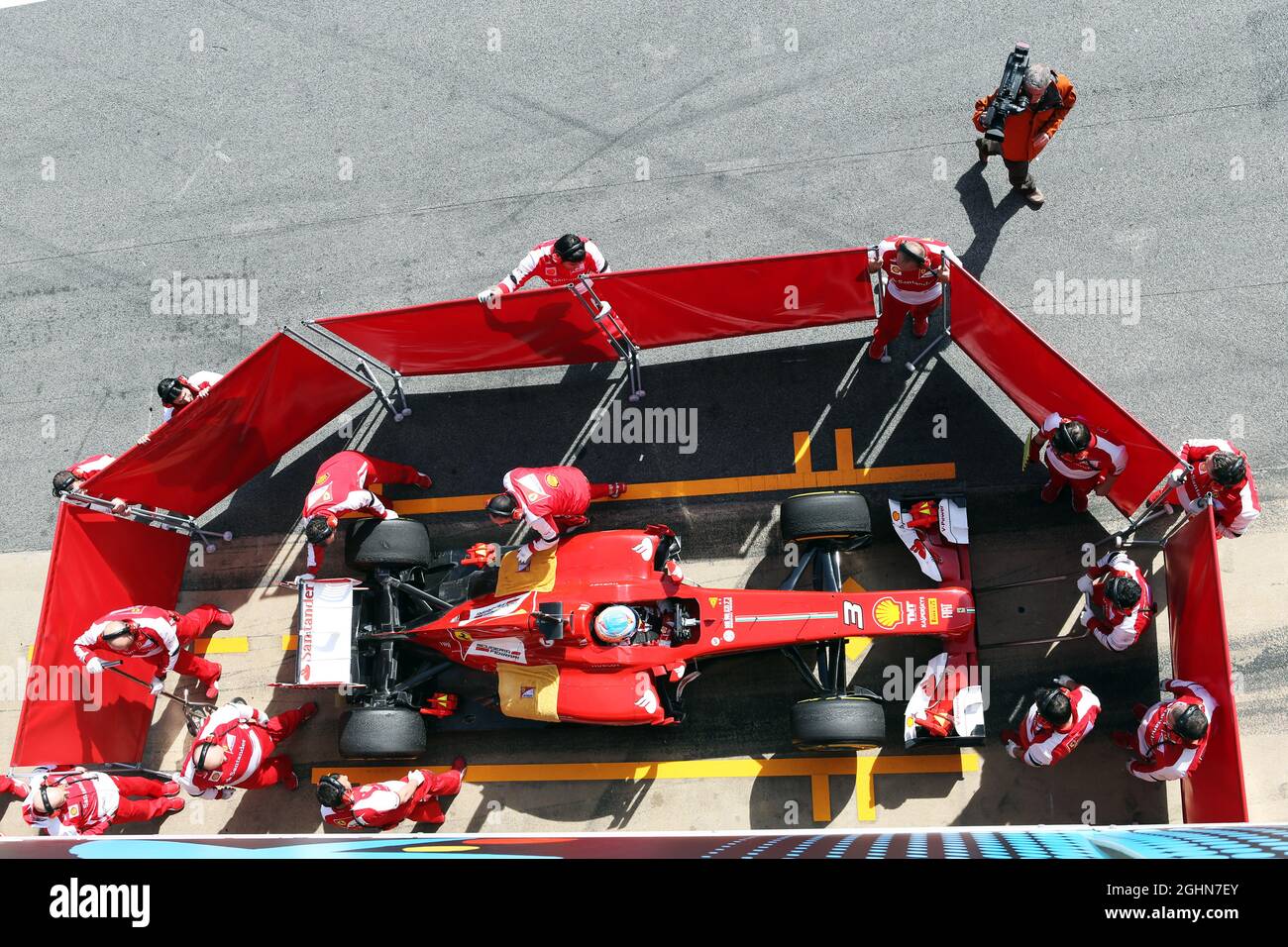 Ferrari f138 in pits hi-res stock photography and images - Alamy