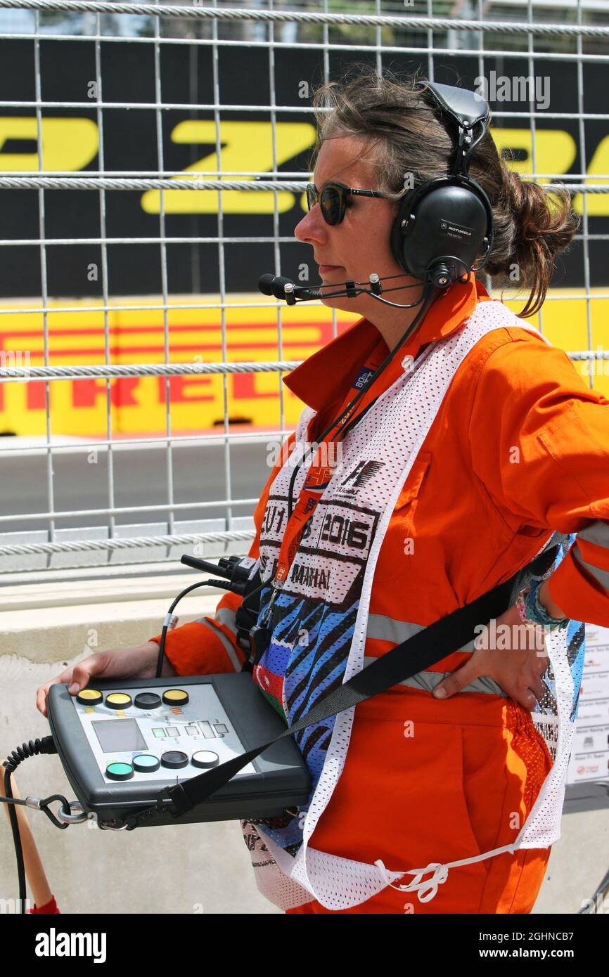 Formula 1 marshal with flag hi-res stock photography and images - Alamy