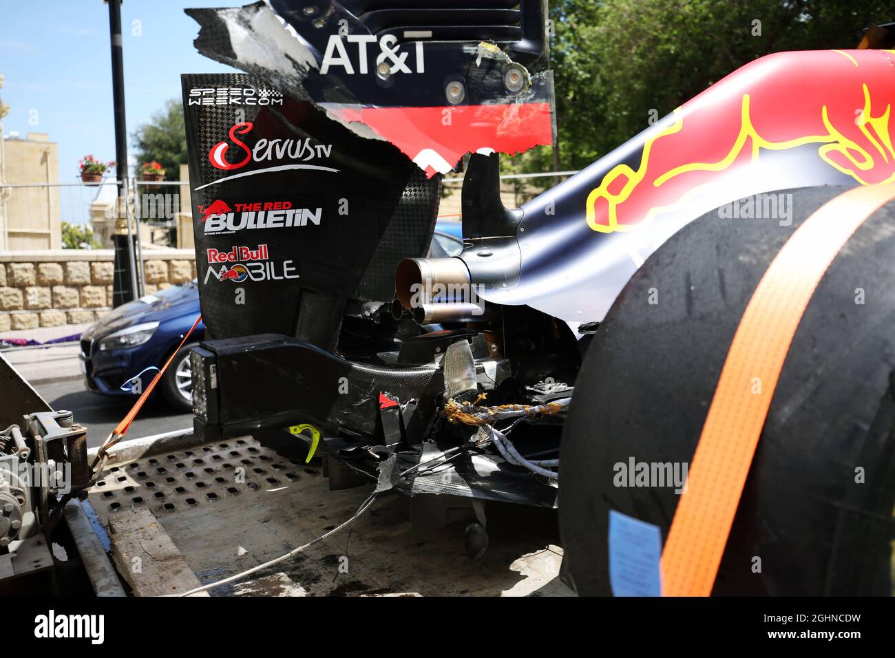 The damaged Red Bull Racing RB12 of Daniel Ricciardo (AUS) is recovered ...