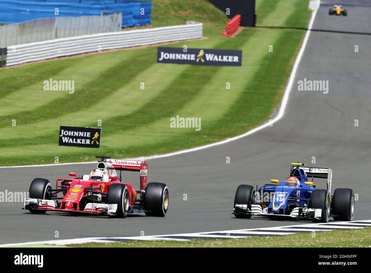 Sebastian Vettel (GER) Ferrari SF16-H and Felipe Nasr (BRA) Sauber C35 ...