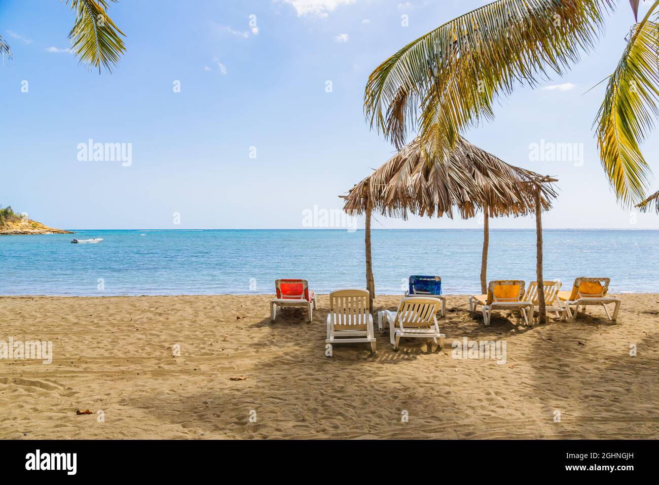 Beach chairs on the beach in Chivirico, Cuba Stock Photo - Alamy