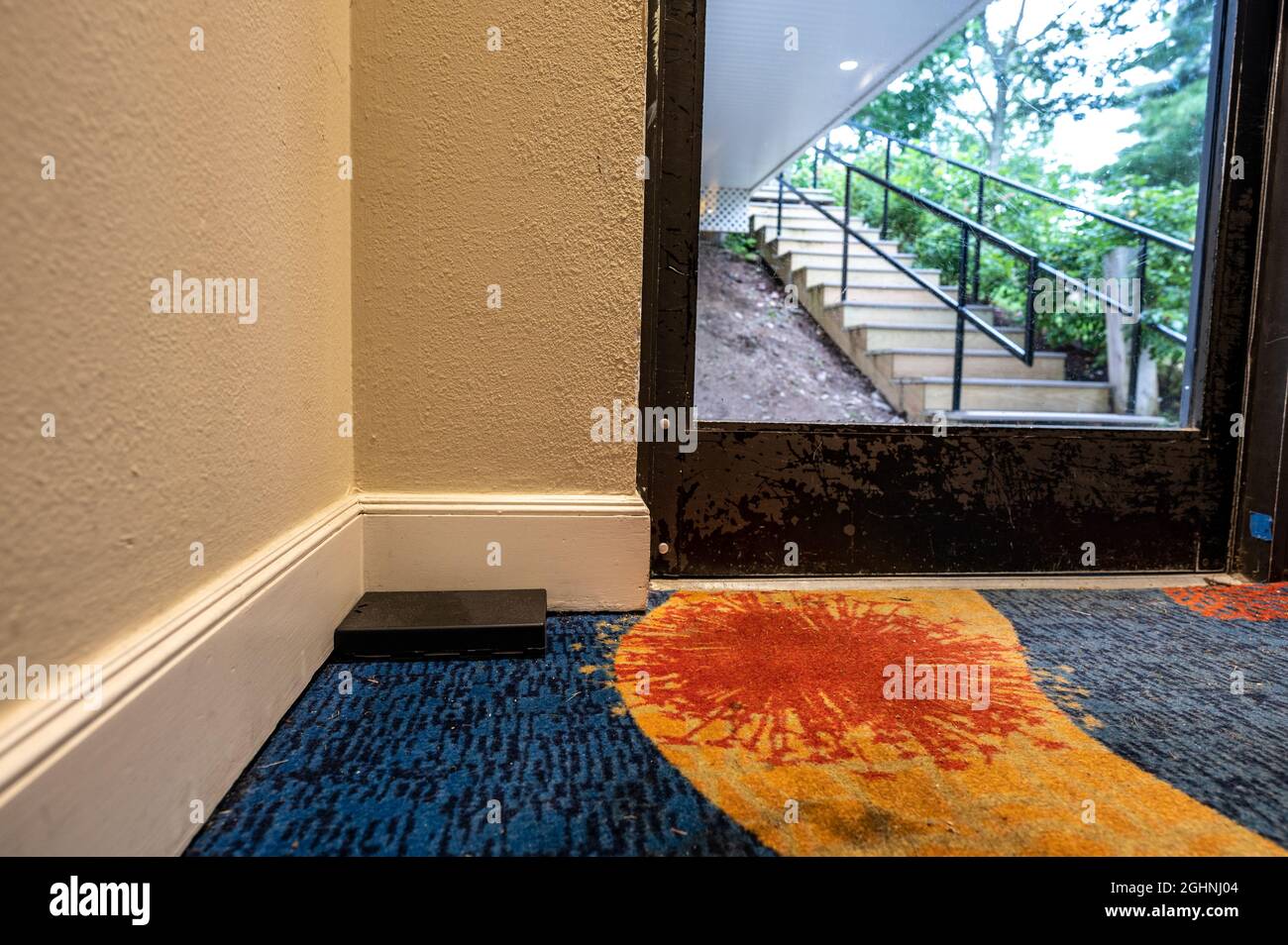 Professional pest control trap located in the entryway of a hotel Stock ...