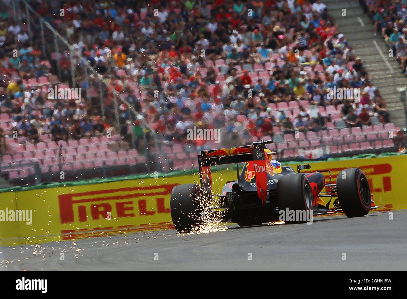 Red bull racing rb12 sends sparks flying hi-res stock photography and ...