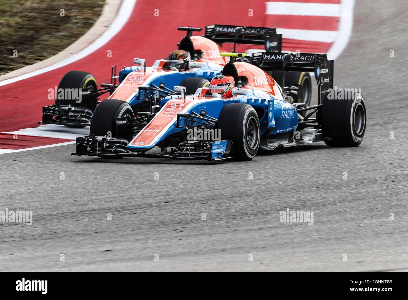 Esteban Ocon (FRA) Manor Racing MRT05 and team mate Pascal Wehrlein ...