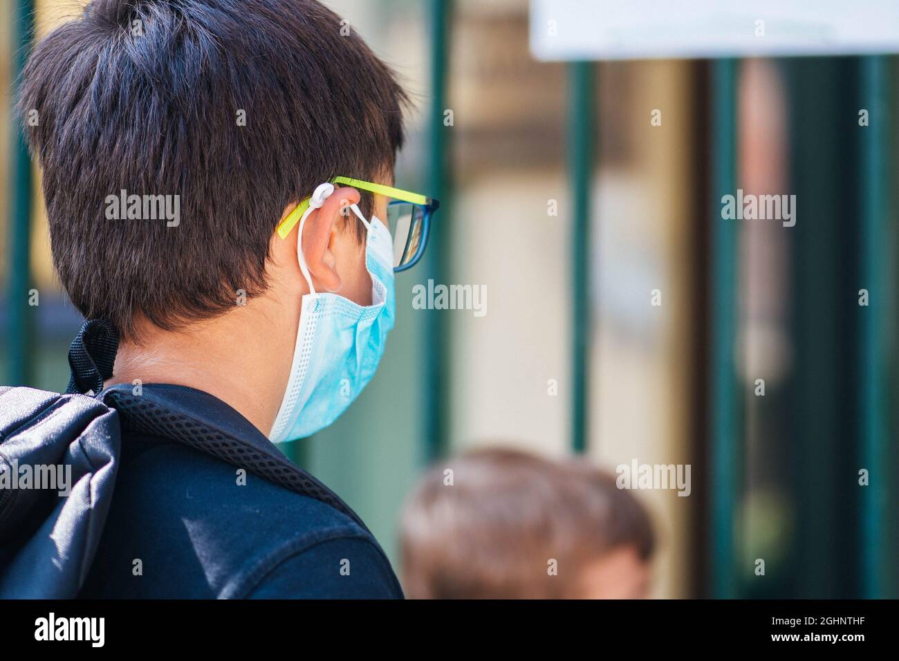 Back to school. Kid or child going to school wearing protective mask ...
