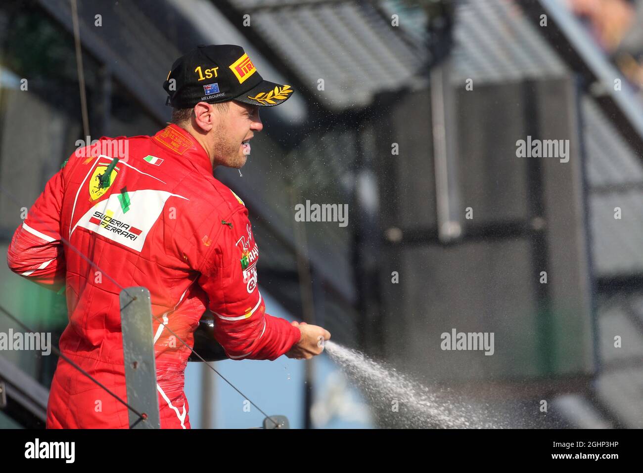 Race winner Sebastian Vettel (GER) Ferrari celebrates on the podium. 26 ...