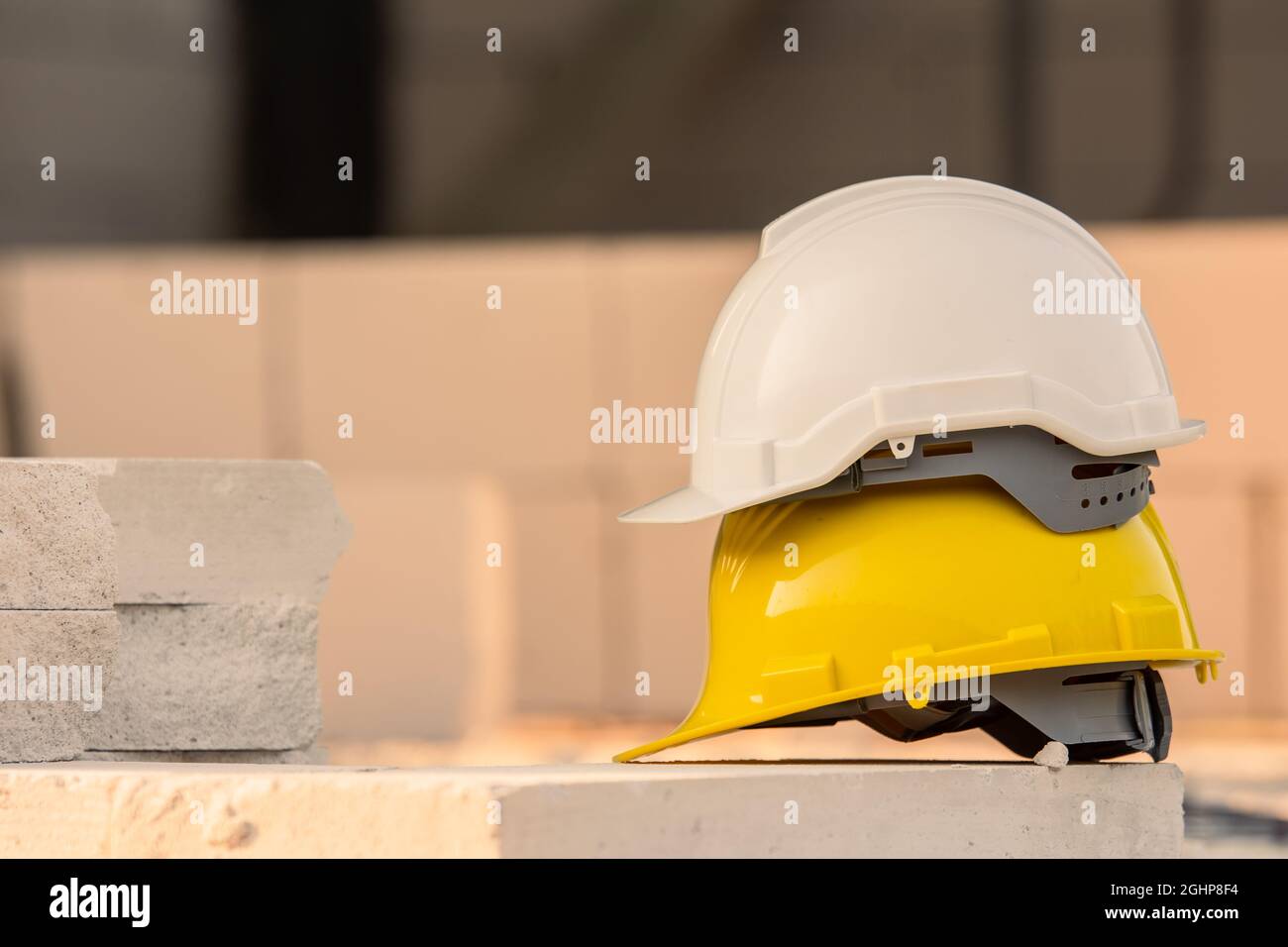 Hard hat on site construction background, Helmet safety, Labor day ...