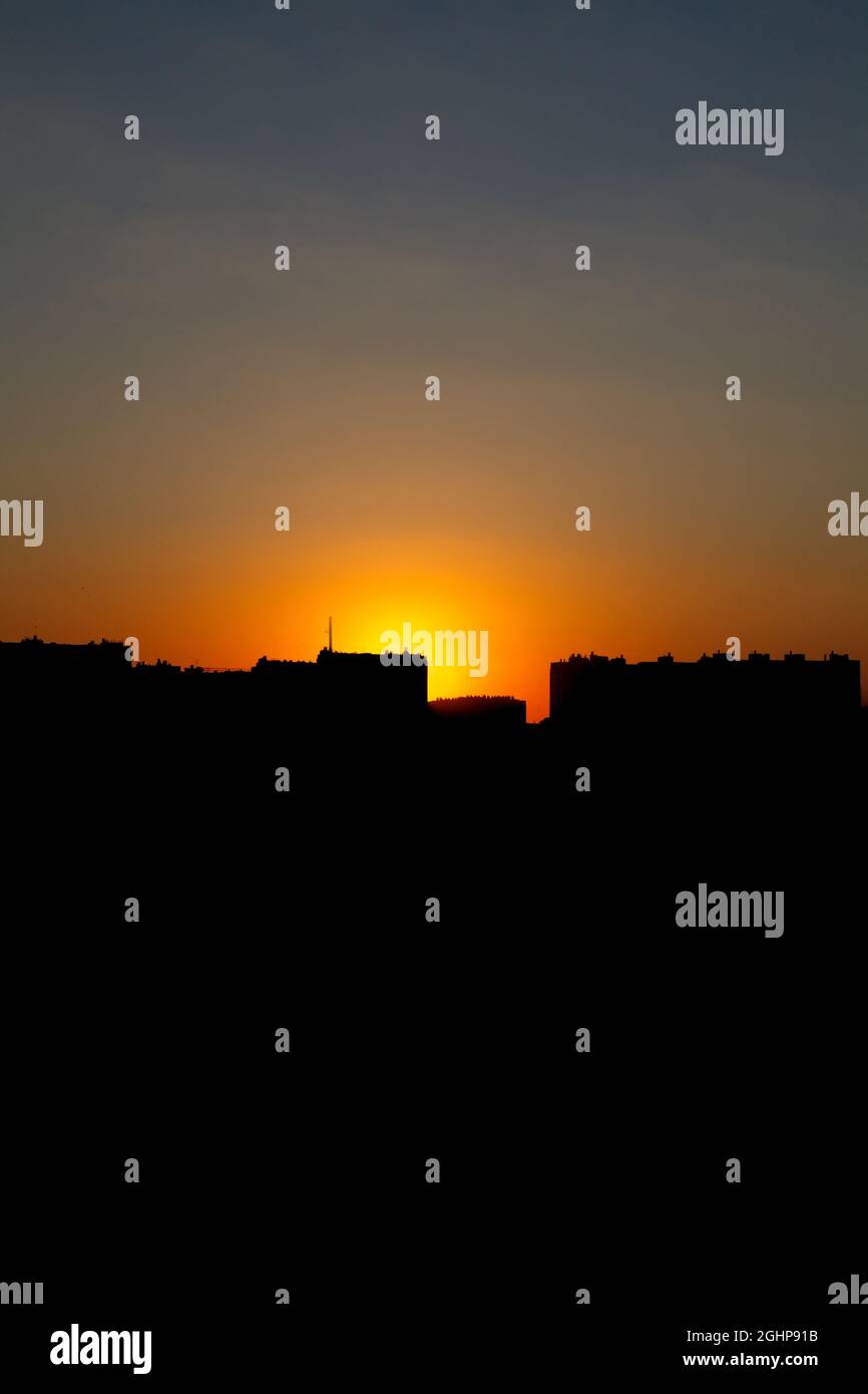 Silhouettes of buildings at sunset or sunrise, the architecture of ...