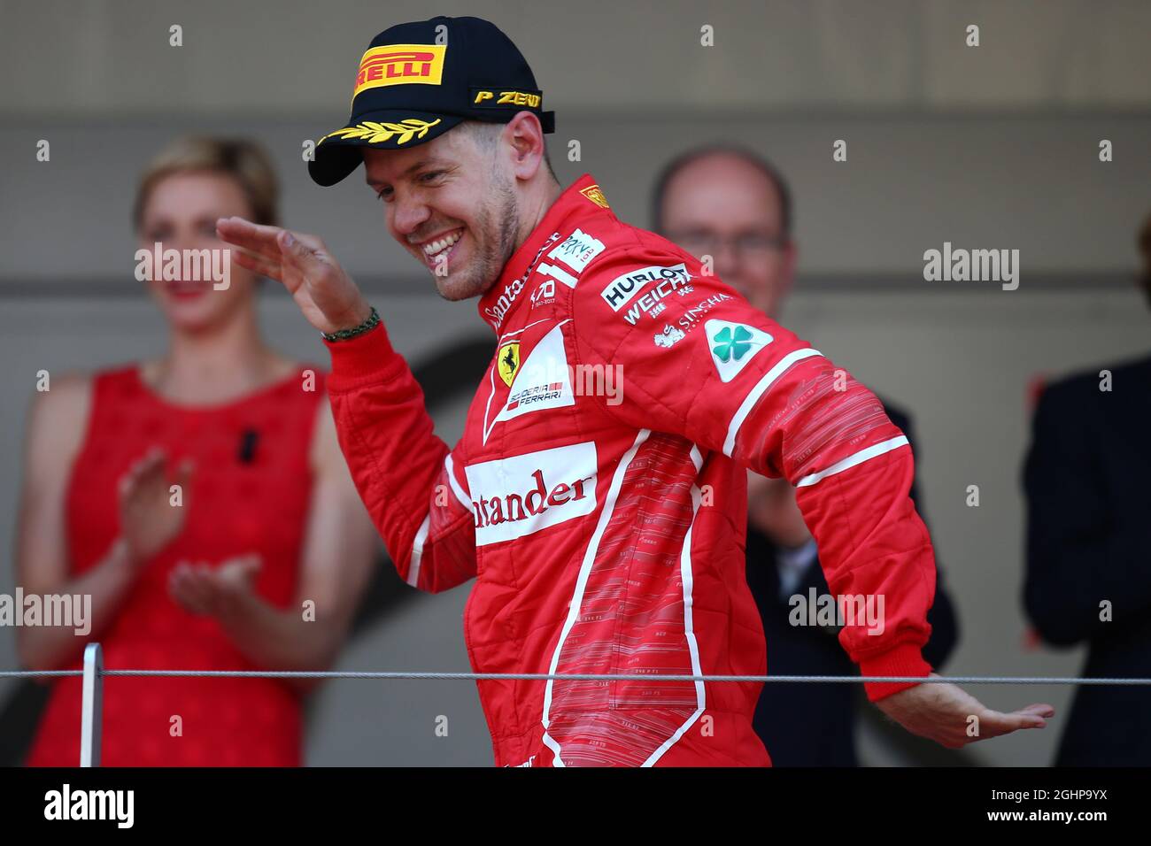 Race winner Sebastian Vettel (GER) Ferrari celebrates on the podium. 28 ...
