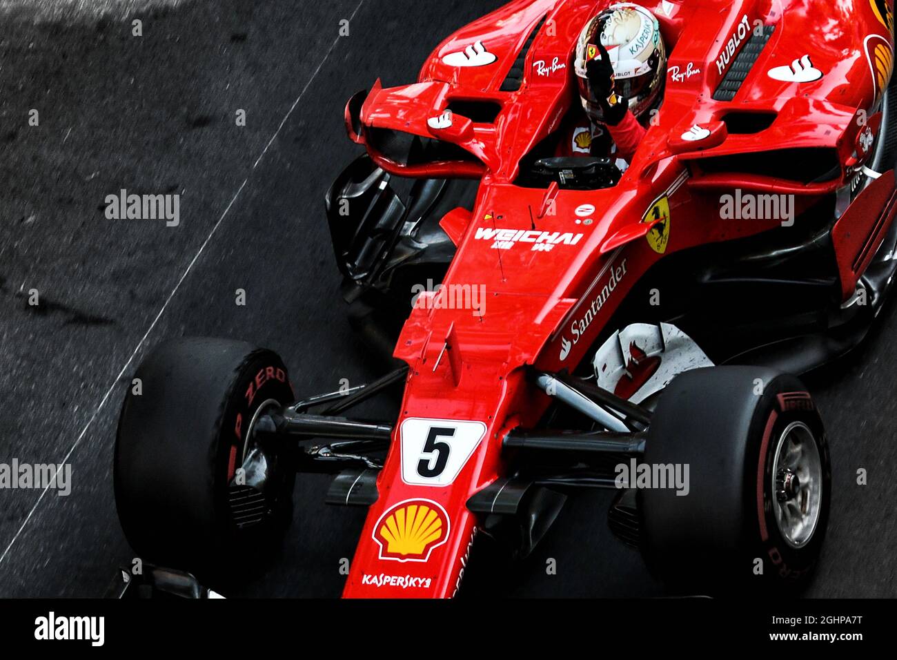 Race winner Sebastian Vettel (GER) Ferrari SF70H celebrates at the end ...