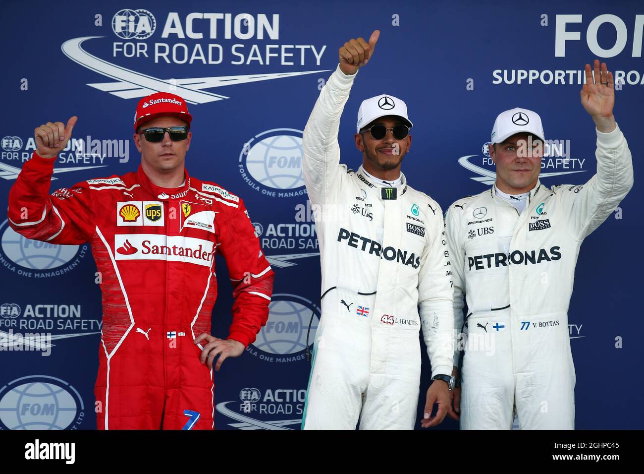 Qualifying top three in parc ferme (L to R): Kimi Raikkonen (FIN ...