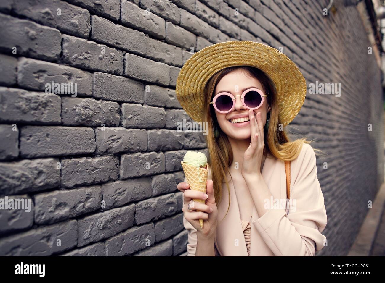 beautiful woman outdoor walk eat ice cream walk travel fun Stock Photo ...