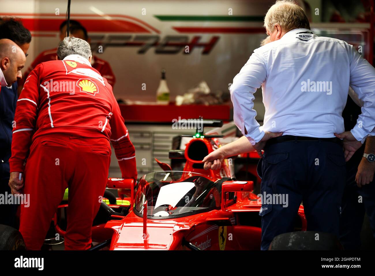 Jo Bauer (GER) FIA Delegate looks at a cockpit cover on the Ferrari ...