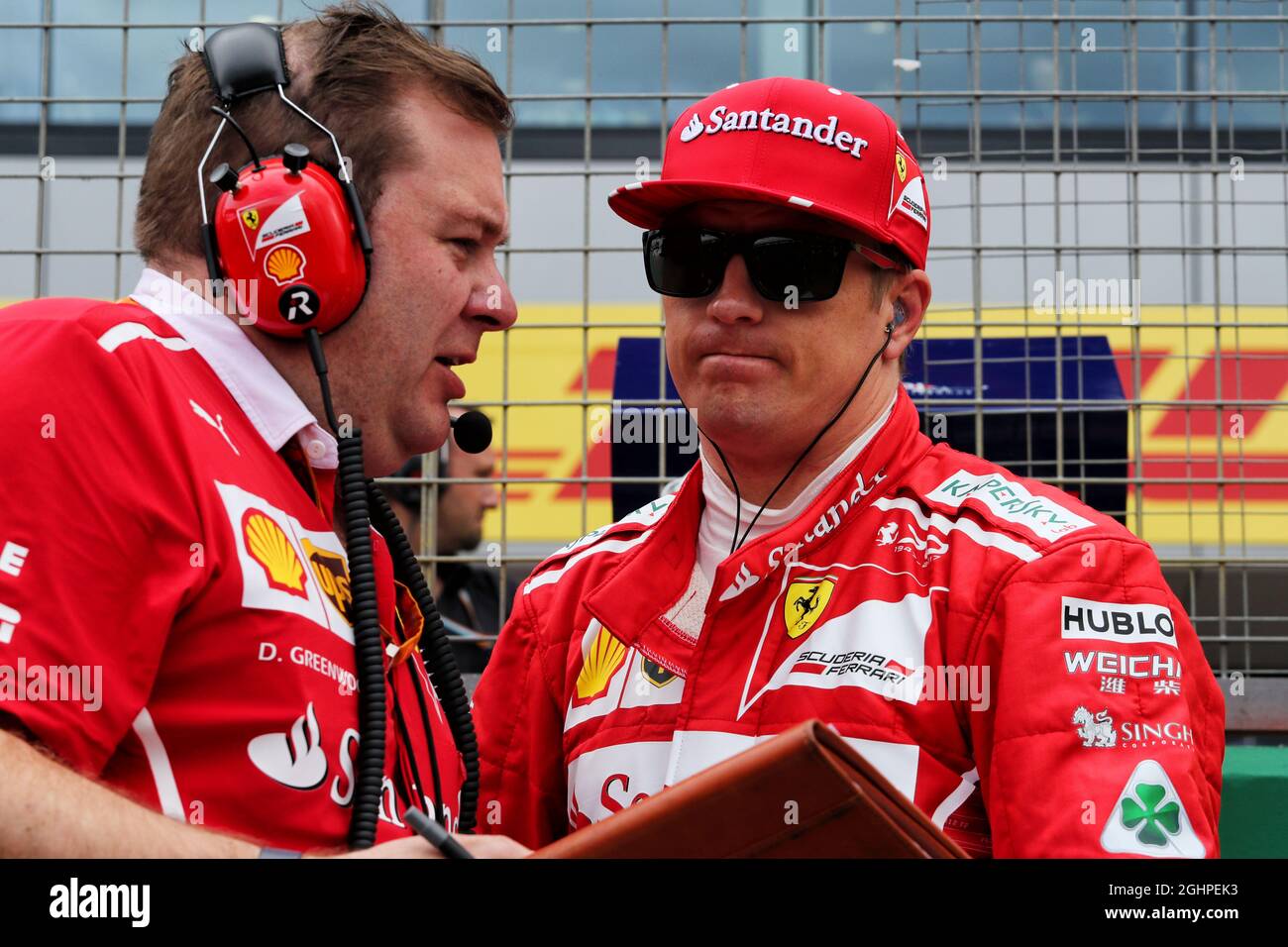Kimi Raikkonen (FIN) Ferrari with Dave Greenwood (GBR) Ferrari Race ...