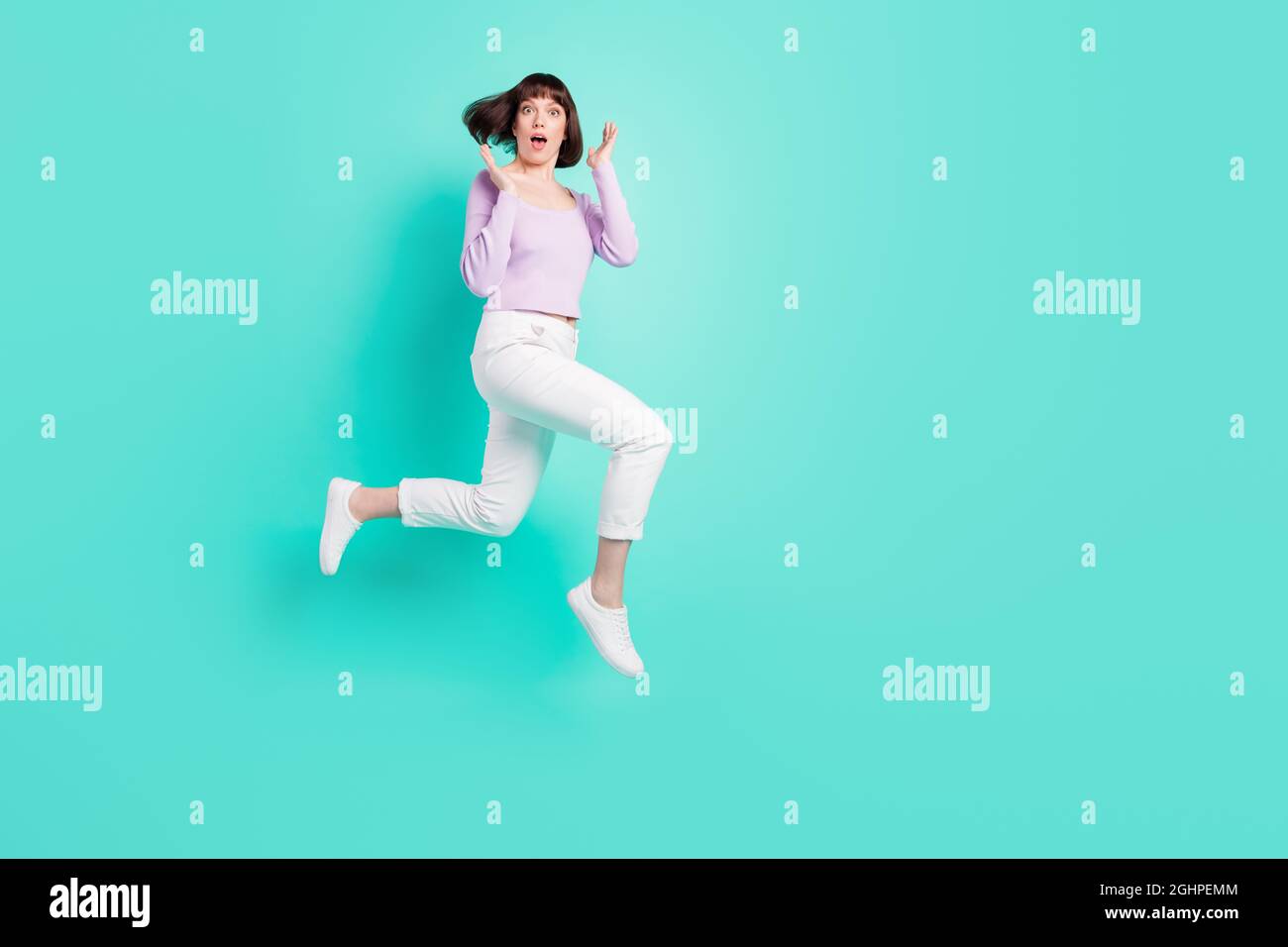 Full length body size photo woman shocked amazed jumping up isolated ...