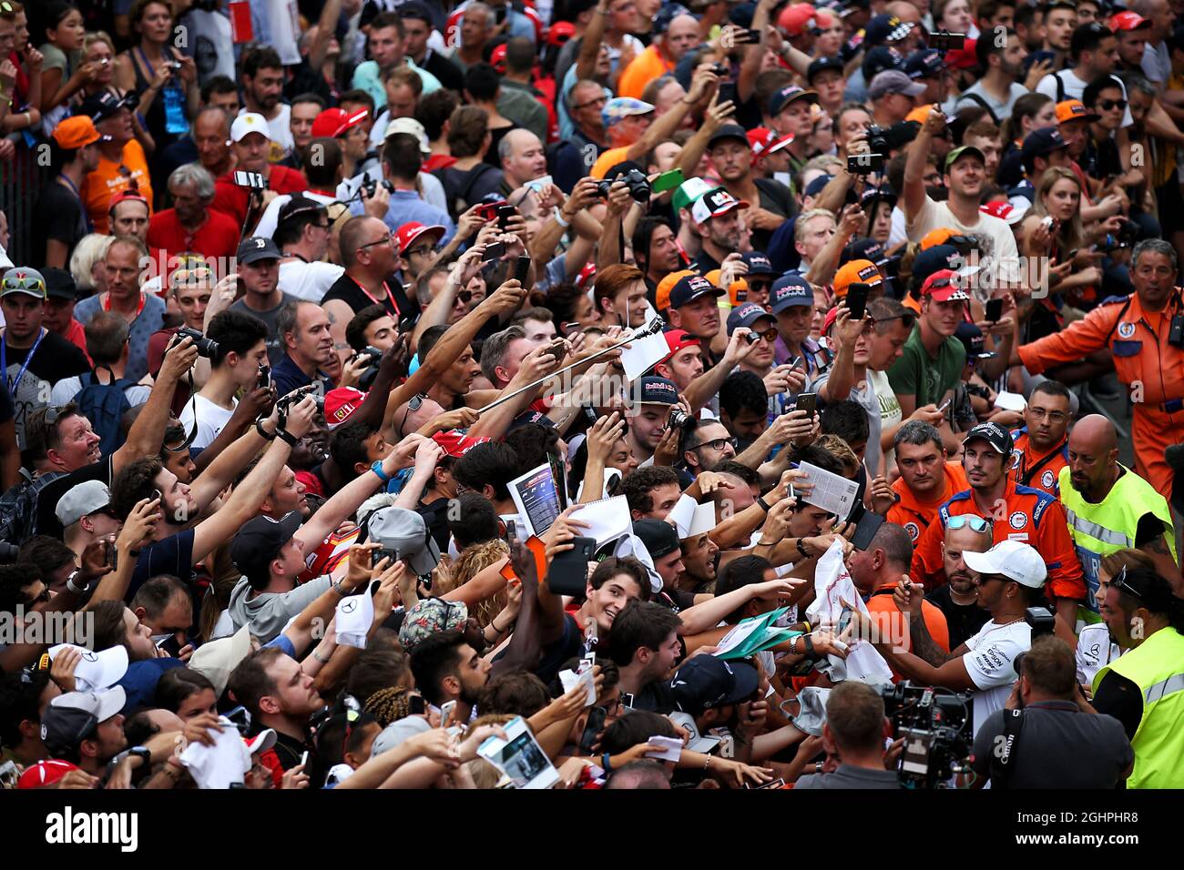 Lewis Hamilton (GBR) Mercedes AMG F1 signs autographs for the fans. 31. ...