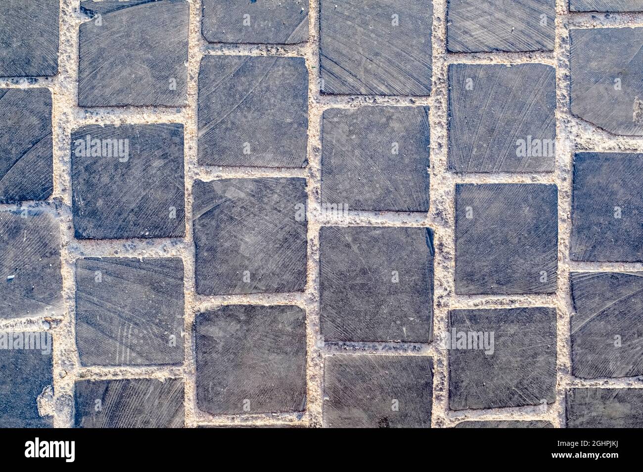 Paving stone, granite square stones, background texture Stock Photo - Alamy
