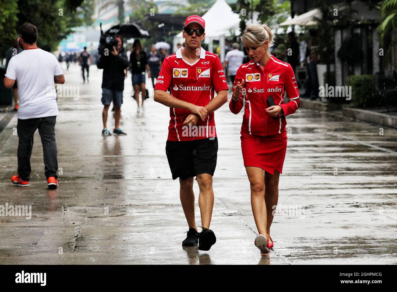 Sebastian Vettel (GER) Ferrari with Britta Roeske (AUT) Ferrari Press ...