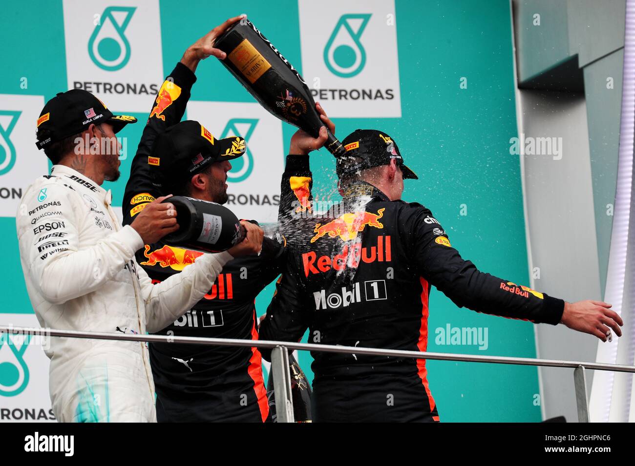 The podium (L to R): Lewis Hamilton (GBR) Mercedes AMG F1 and Daniel ...