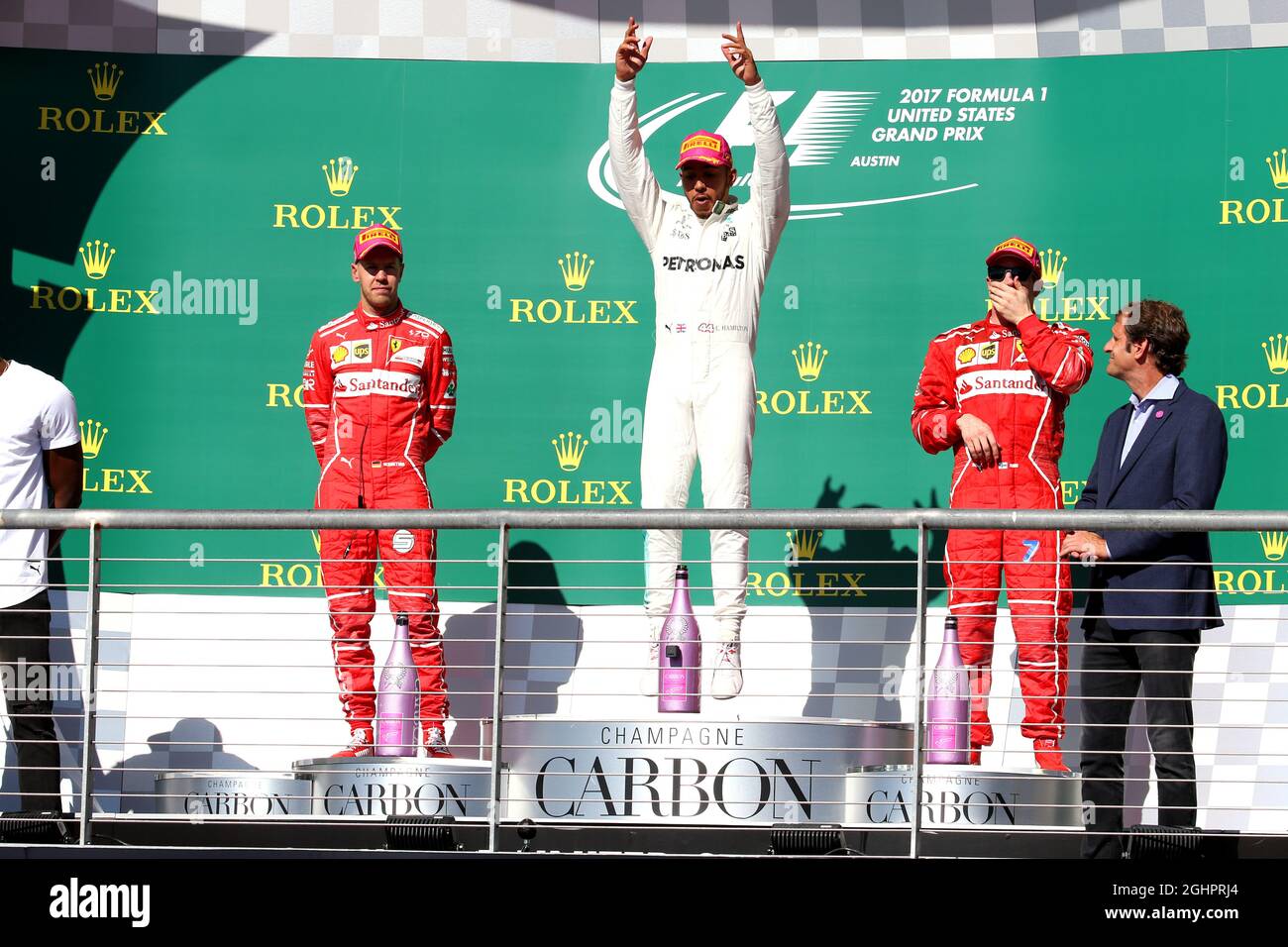 The podium (L to R): Sebastian Vettel (GER) Ferrari, second; Lewis ...