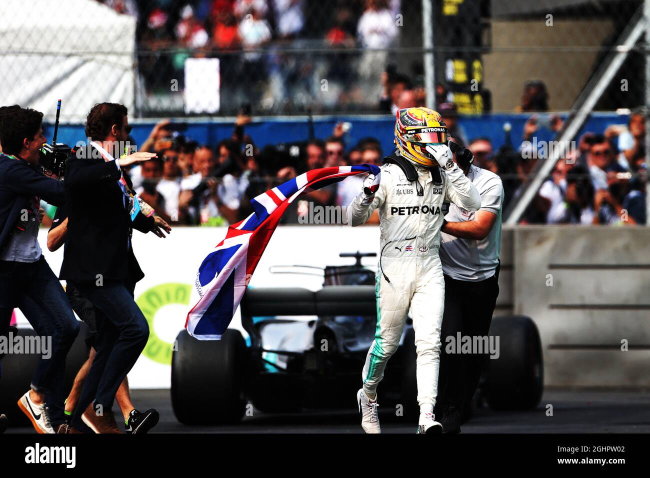 Lewis Hamilton (GBR) Mercedes AMG F1 W08 celebrates his World ...