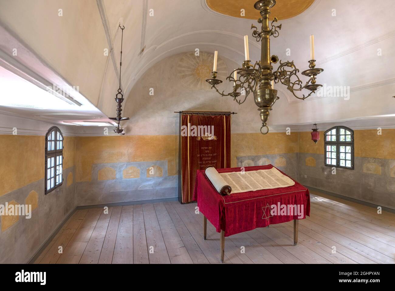 Table with Torah scroll and Torah cupboard in the synagogue in the ...