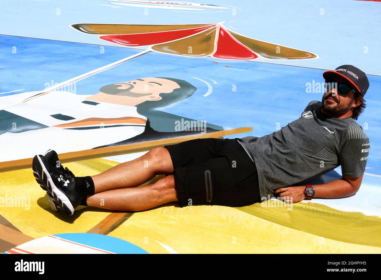 Fernando Alonso (ESP) McLaren with the painting of himself sunbathing ...