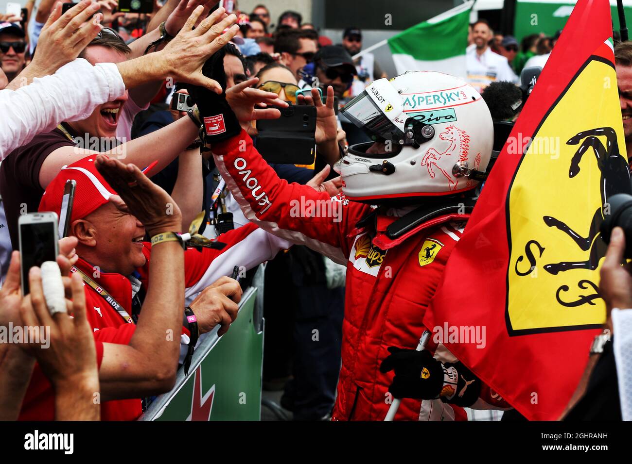 Race winner Sebastian Vettel (GER) Ferrari celebrates in parc ferme. 10 ...