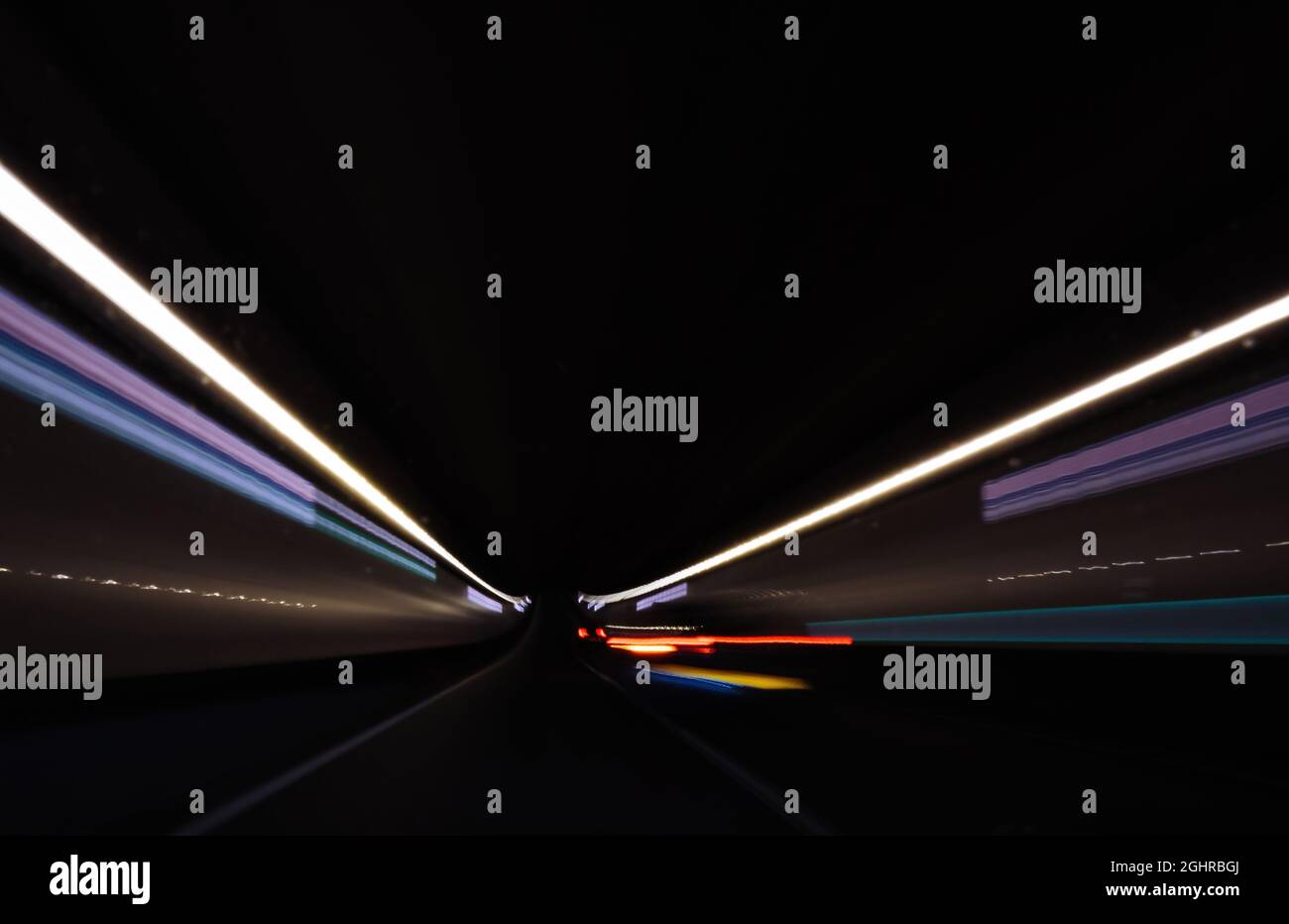 Driving in the tunnel with long light Stock Photo - Alamy