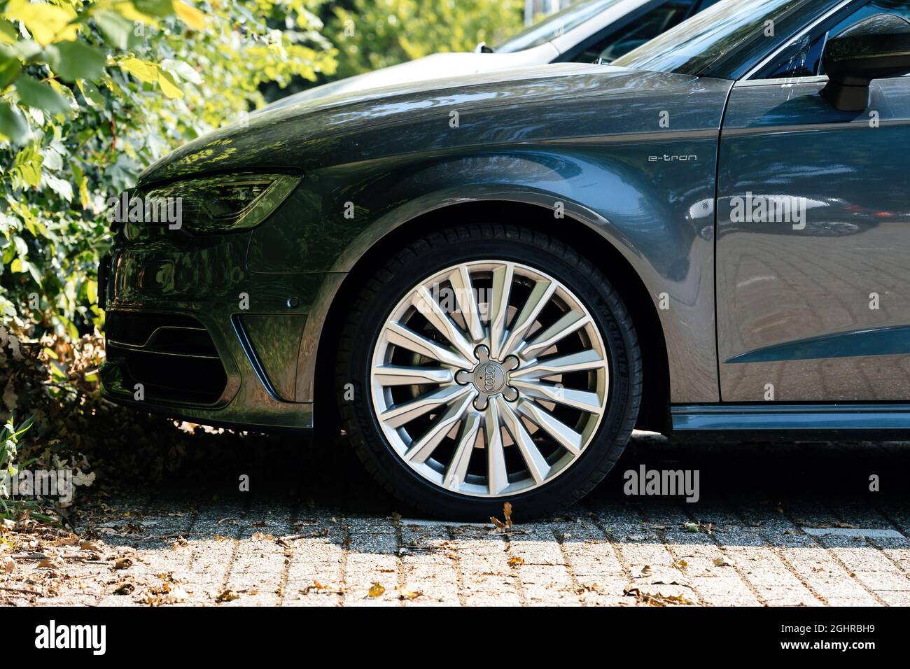 Side view of new Audi E-TRON car with aluminum rims Stock Photo - Alamy